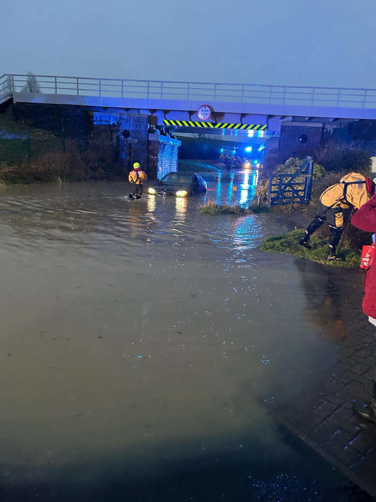Flood under bridge that trapped driver linked to rail project, resident ...